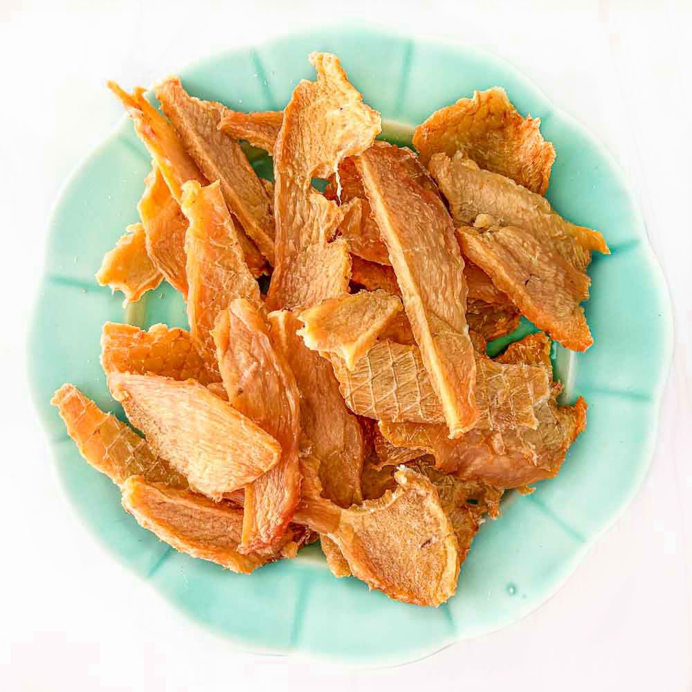 Protein-Packed Snack Hack: 4 Homemade Chicken Jerky Recipes for Your Dog! - Rocky Kanaka